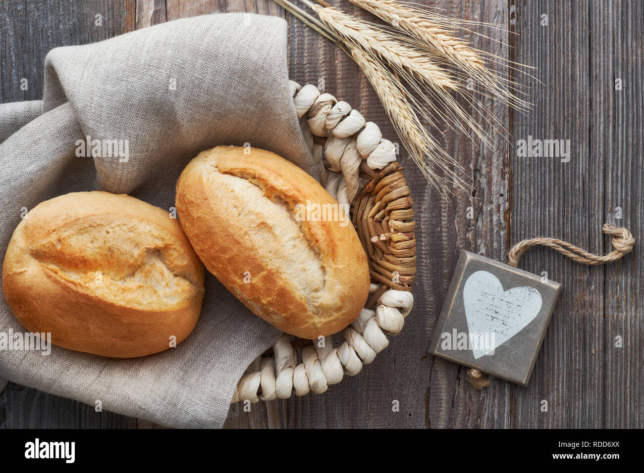 Bread rolls on white heart hi-res stock photography and images - Alamy