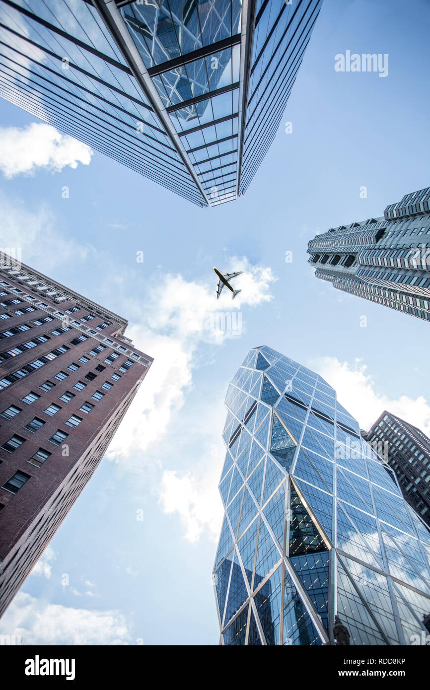 the plane flies low over the New York City Manhattan Skyline Stock ...