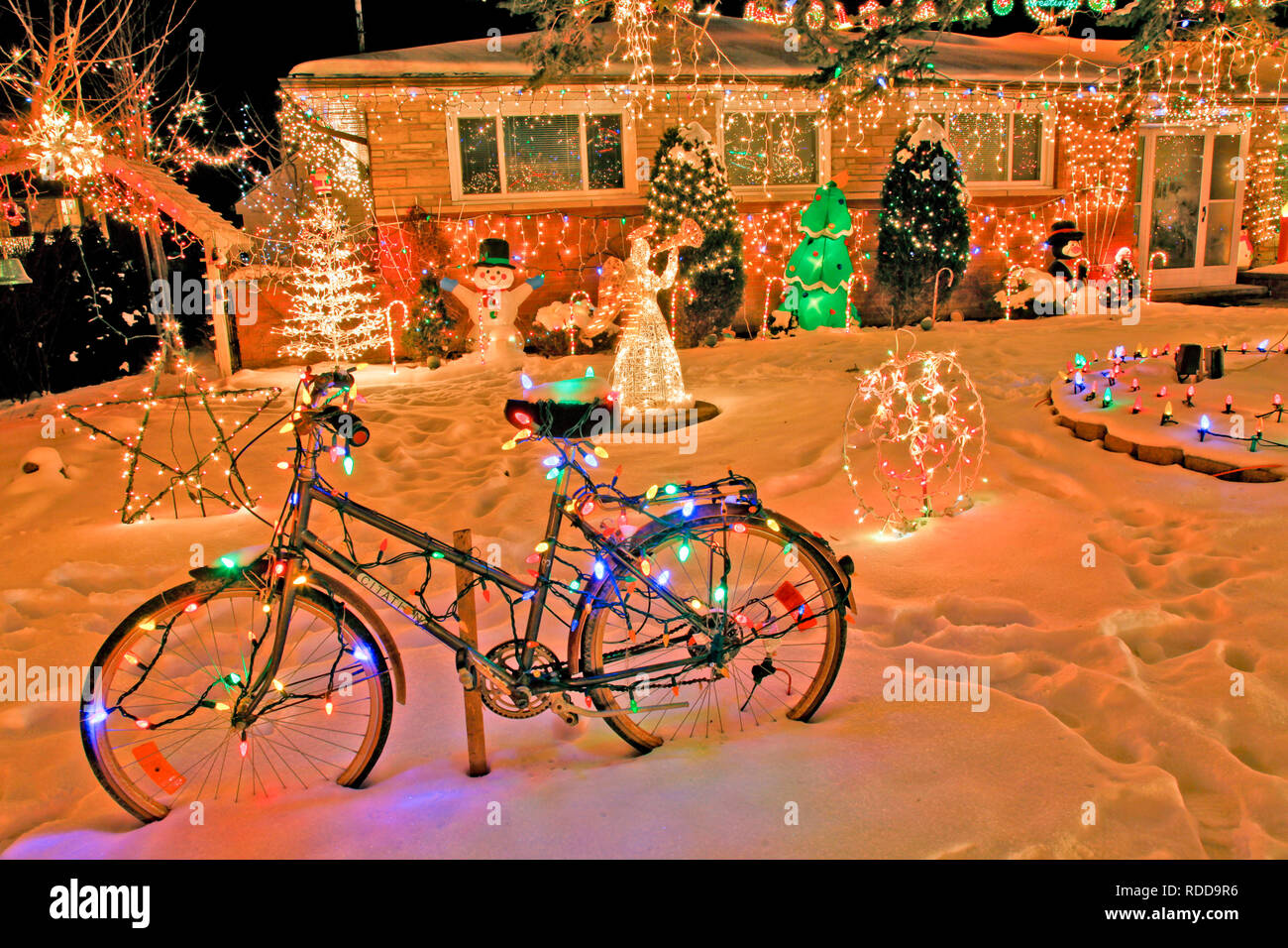 Christmas bycicle Decorations with colorful lights and annimation at a ...
