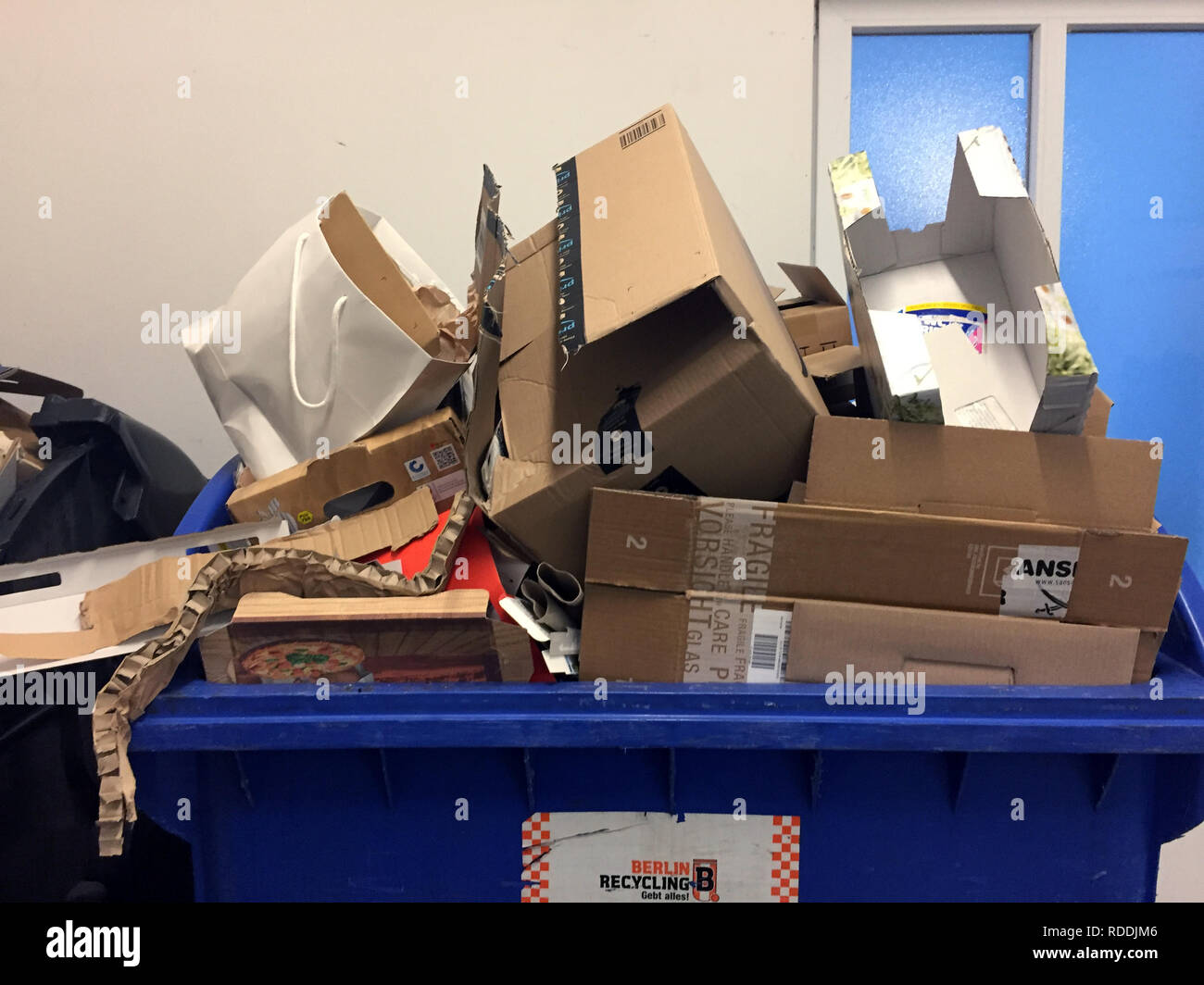 17 January 2019, Germany (German), Berlin: Waste paper barrels full to bursting with paper ...