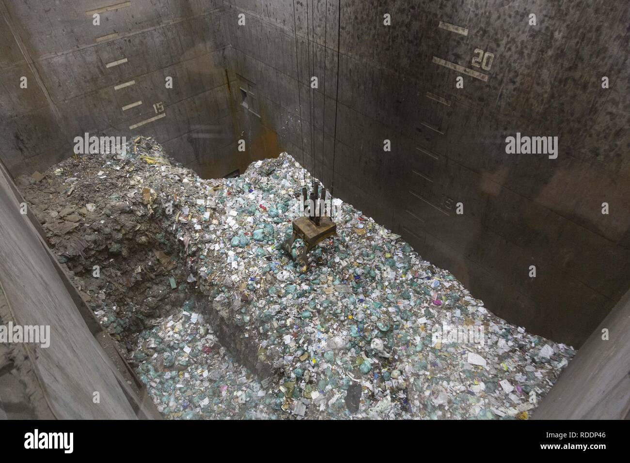 Tokyo, Japan. 18th Jan, 2019. A crane carrying trash is seen from a ...