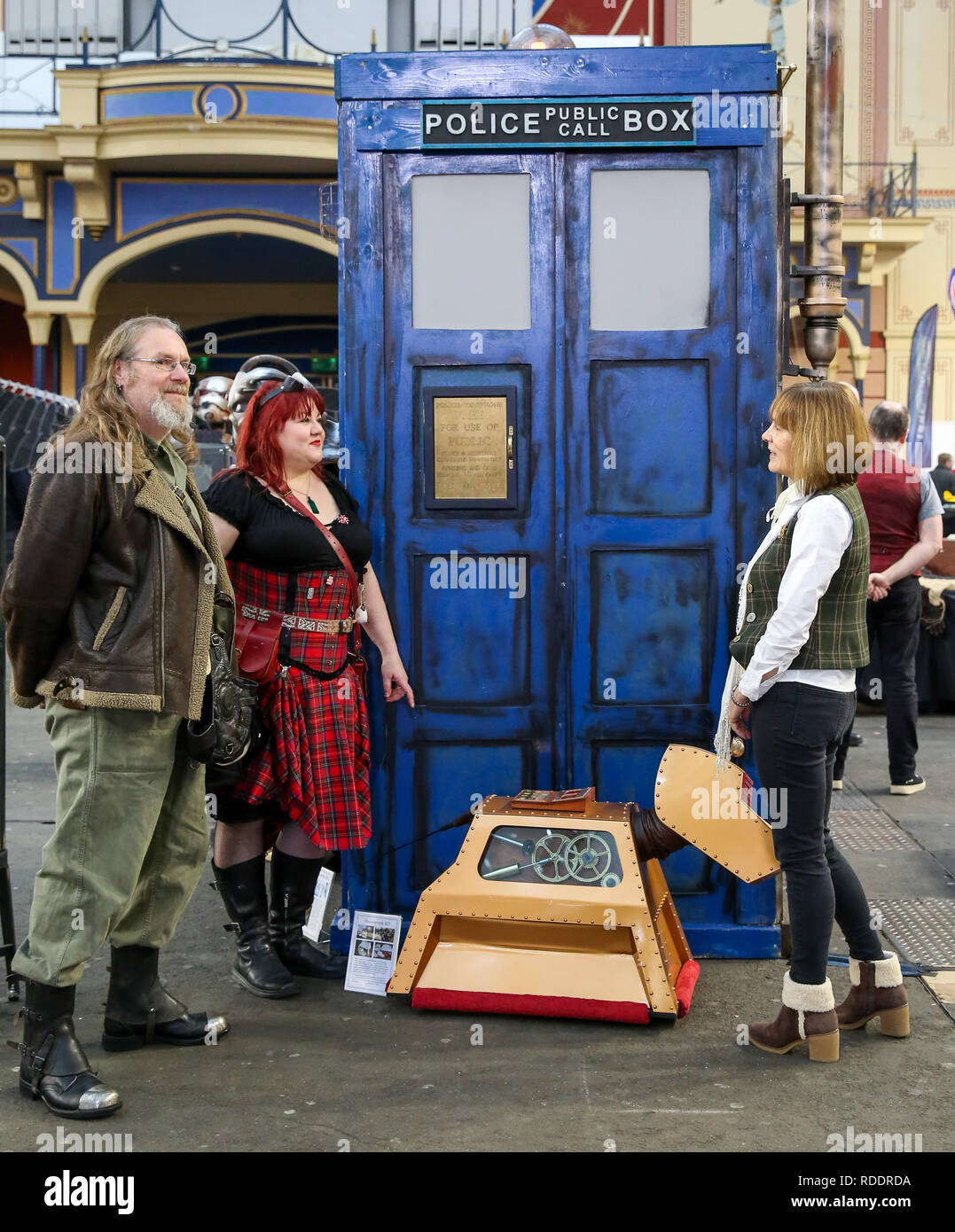 Enthusiasts are seen at the Steam of Steampunk stand at annual London ...