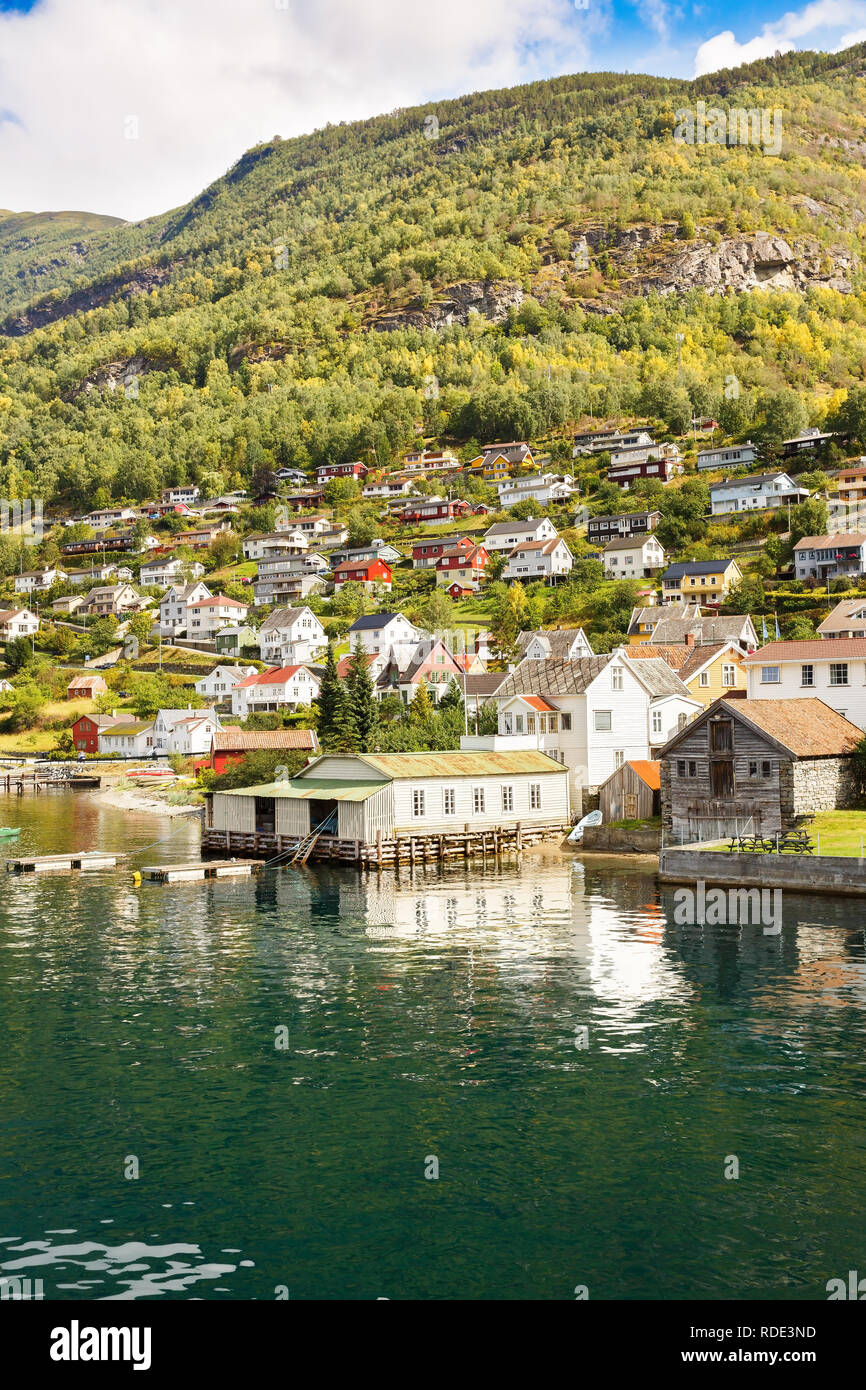 Landscape with Naeroyfjord, mountains and traditional village houses in ...