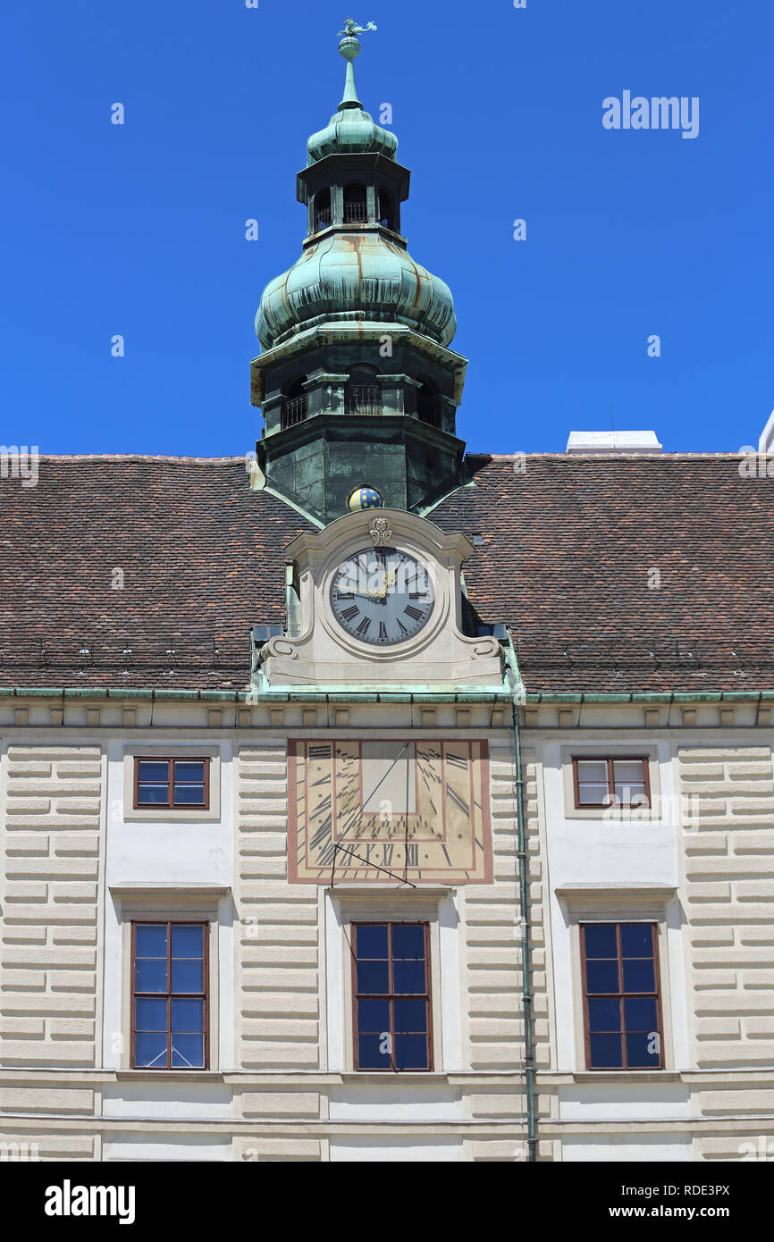 Sundial and Public Clock at Building in Vienna Stock Photo - Alamy