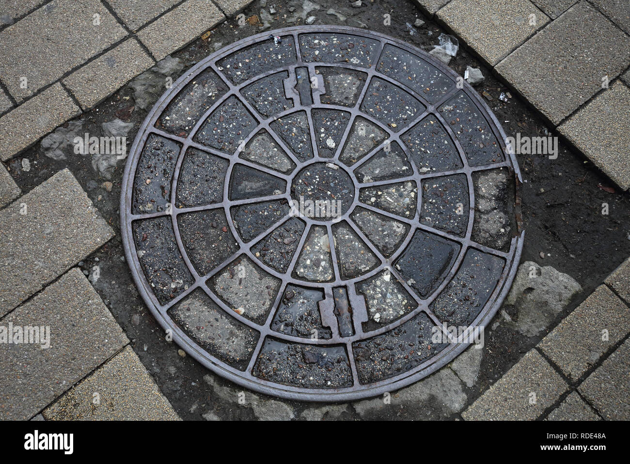 Concentric Circles at Manhole Cover Utility Shaft Stock Photo - Alamy