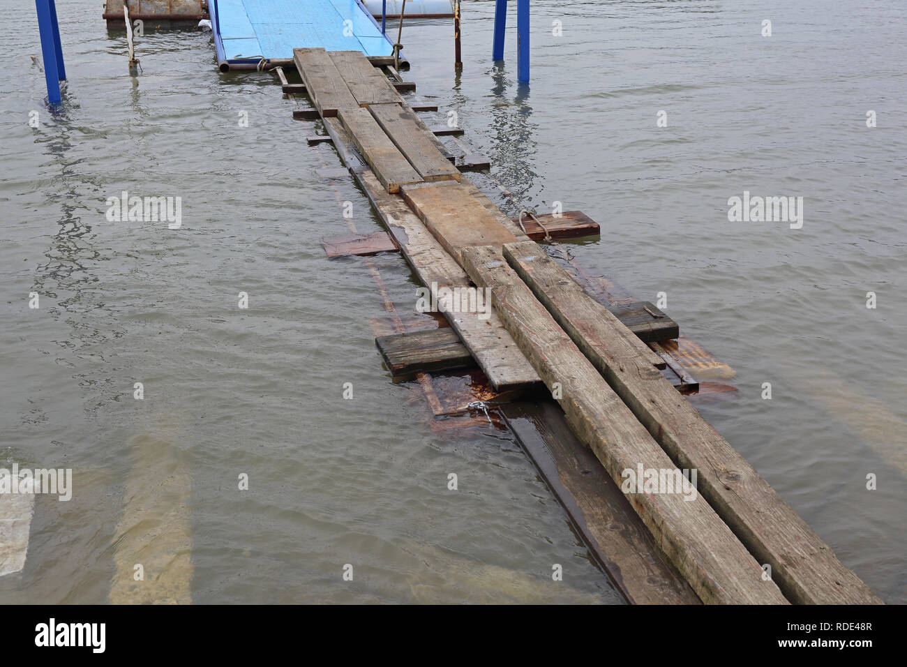 Floating Plank Boards Bridge Over Water Floods Stock Photo - Alamy