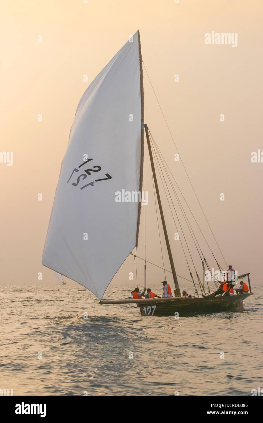 A traditional racing dhow approaching the finishing line off Dubai at ...