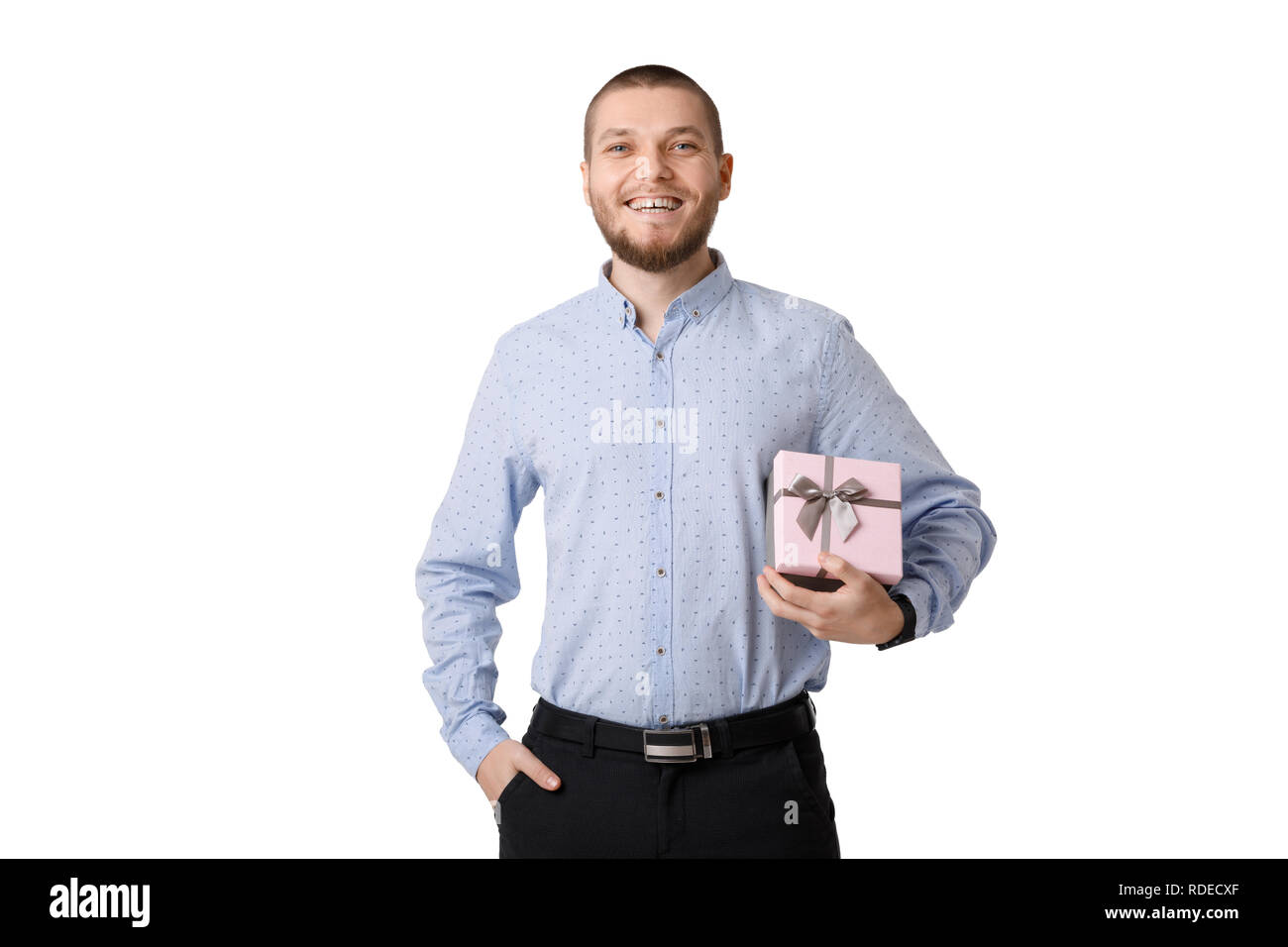 man in gray hat holding gift box on white background Stock Photo - Alamy
