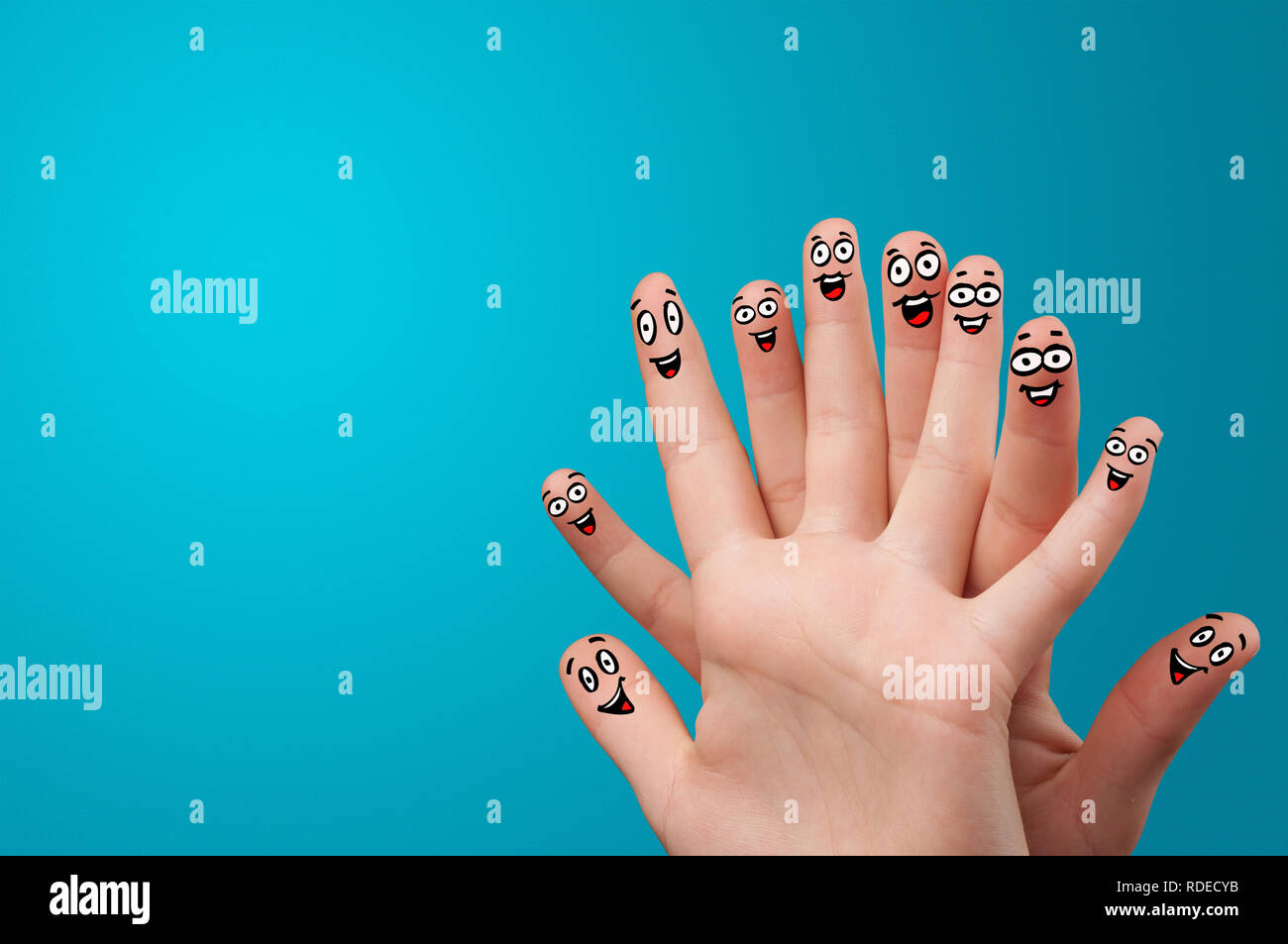 Happy face fingers hug each other Stock Photo - Alamy