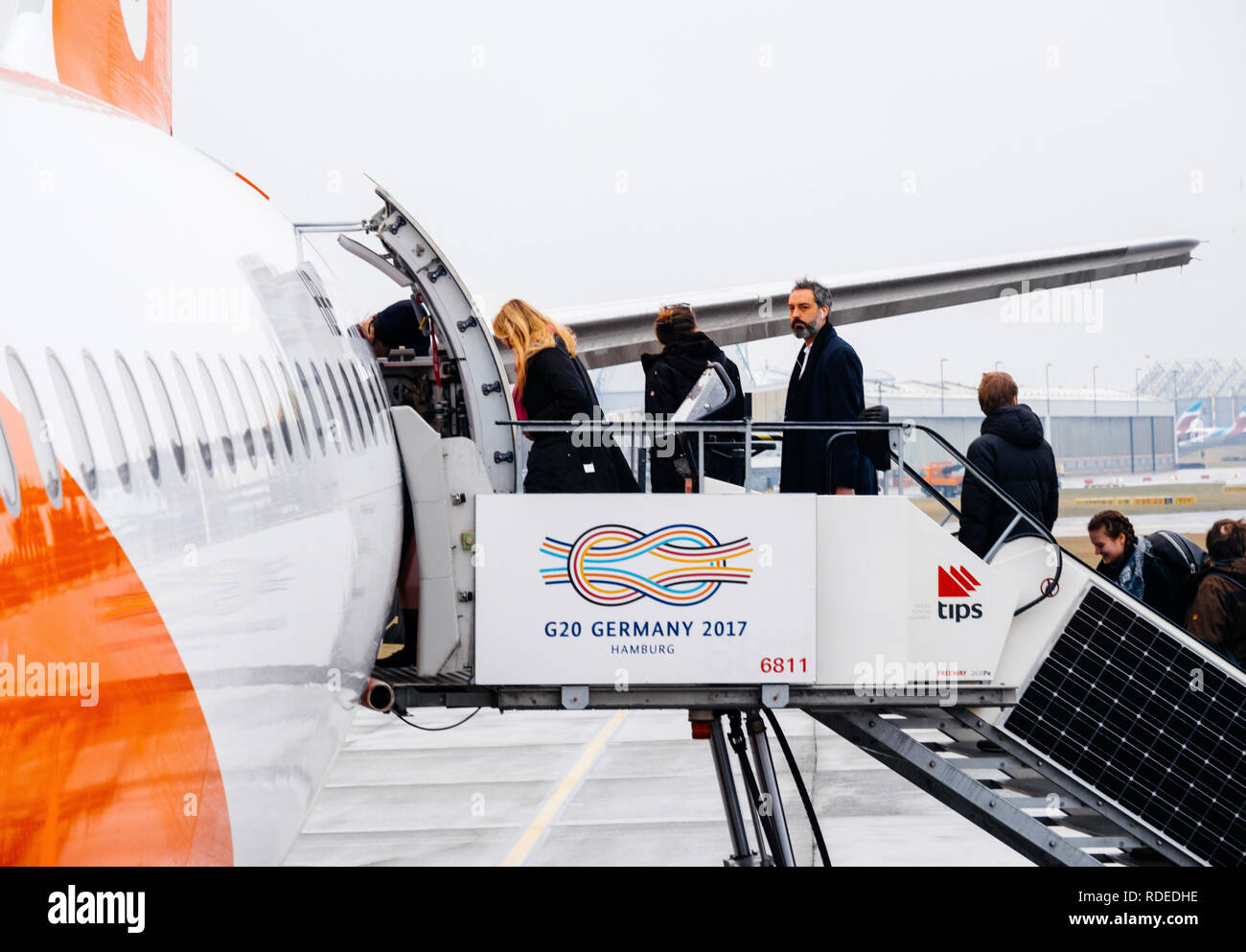 HAMBURG, GERMANY - MAR 22, 2018: People entering EasyJet airplane early ...
