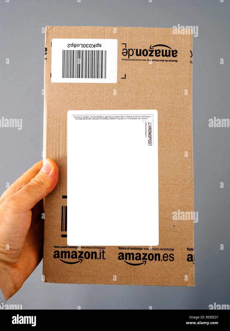 PARIS, FRANCE - APR 24, 2018: Man holding the front view with white ...