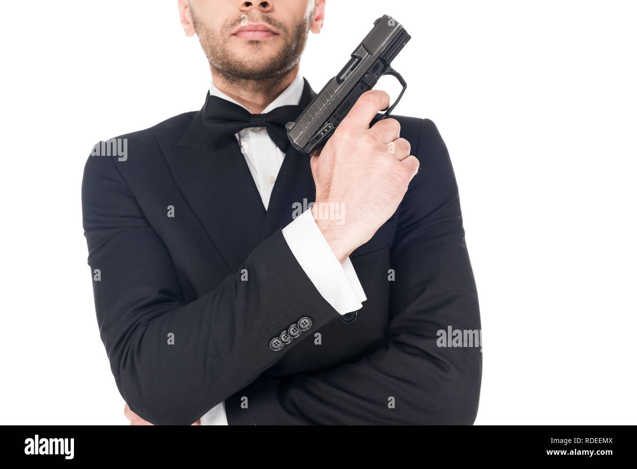 cropped view of secret agent in black suit holding gun, isolated on ...
