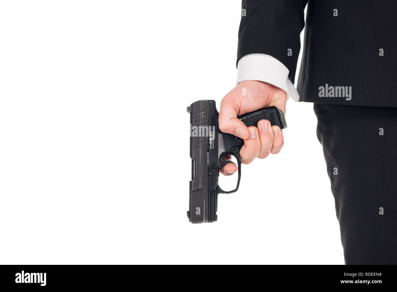 partial view of secret agent holding gun, isolated on white Stock Photo ...