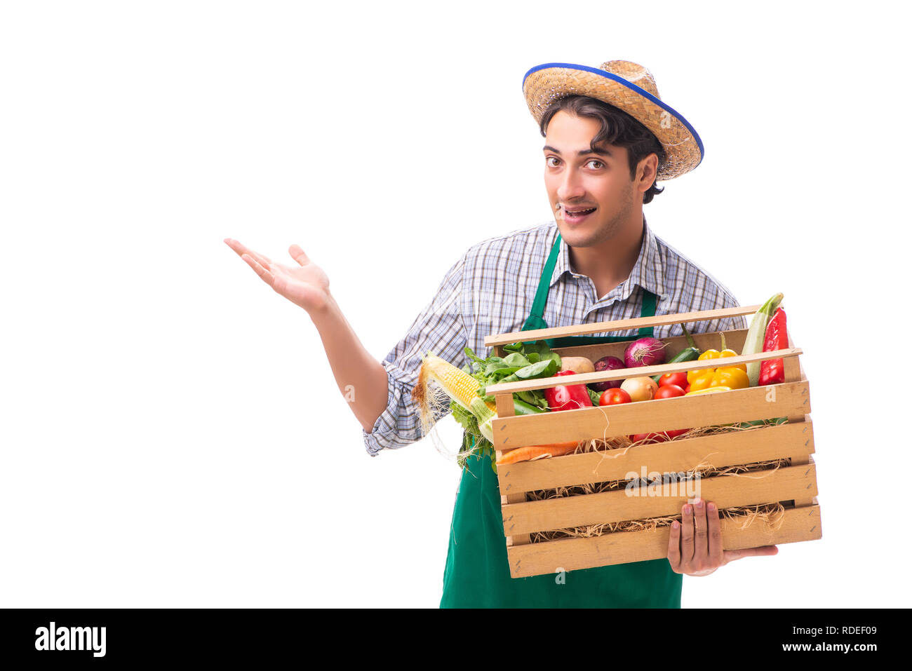 Young farmer with fresh produce isolated on white background Stock ...