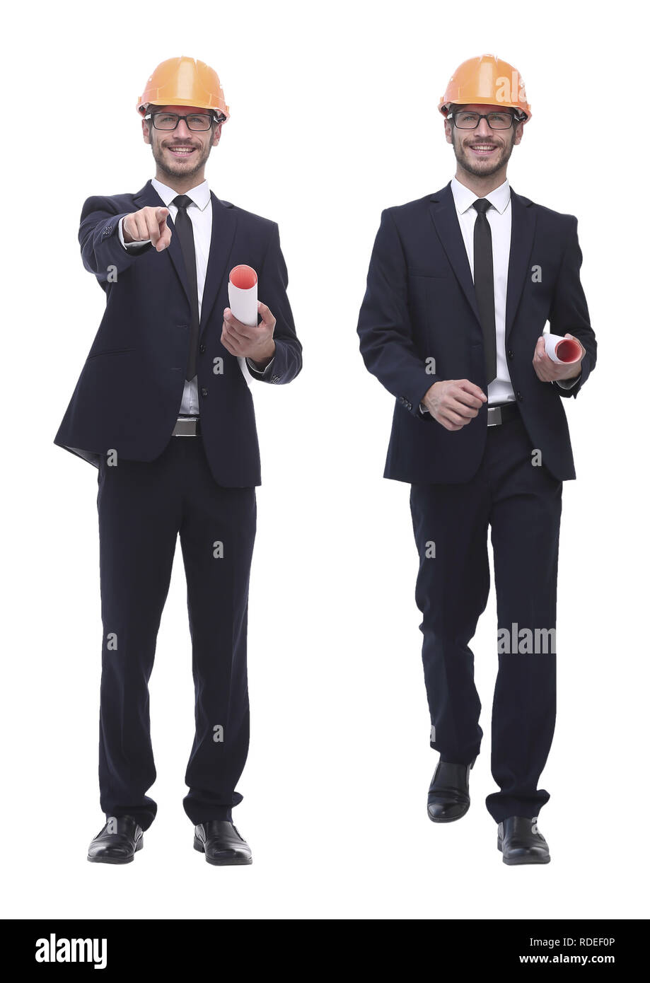 full-length .architect in orange helmet with drawings for new project ...