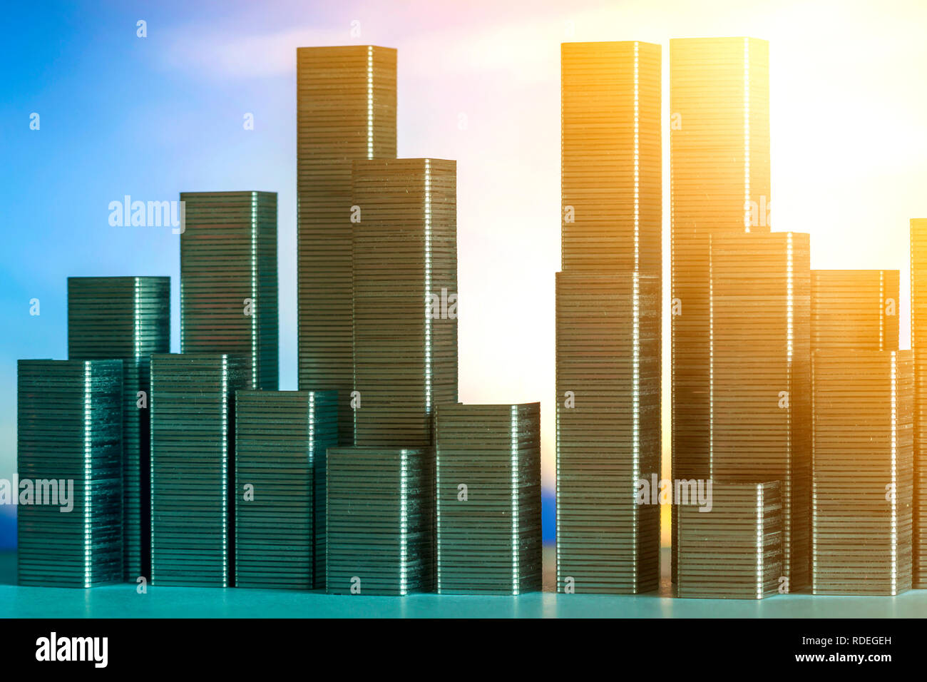 Staples arranged to form city skyline on a sunset background Stock ...