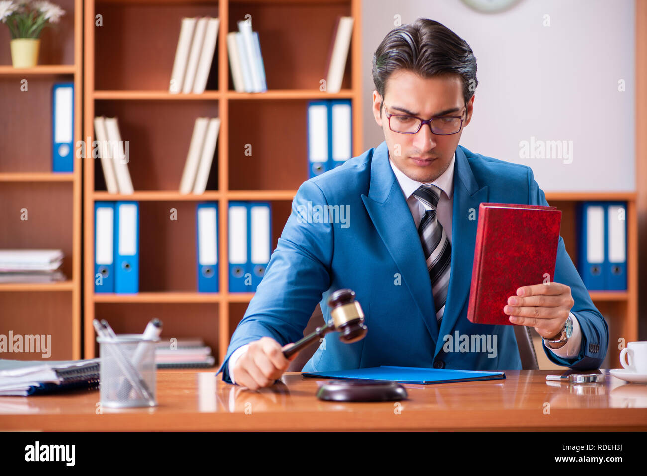 Lawyer working in the office Stock Photo - Alamy