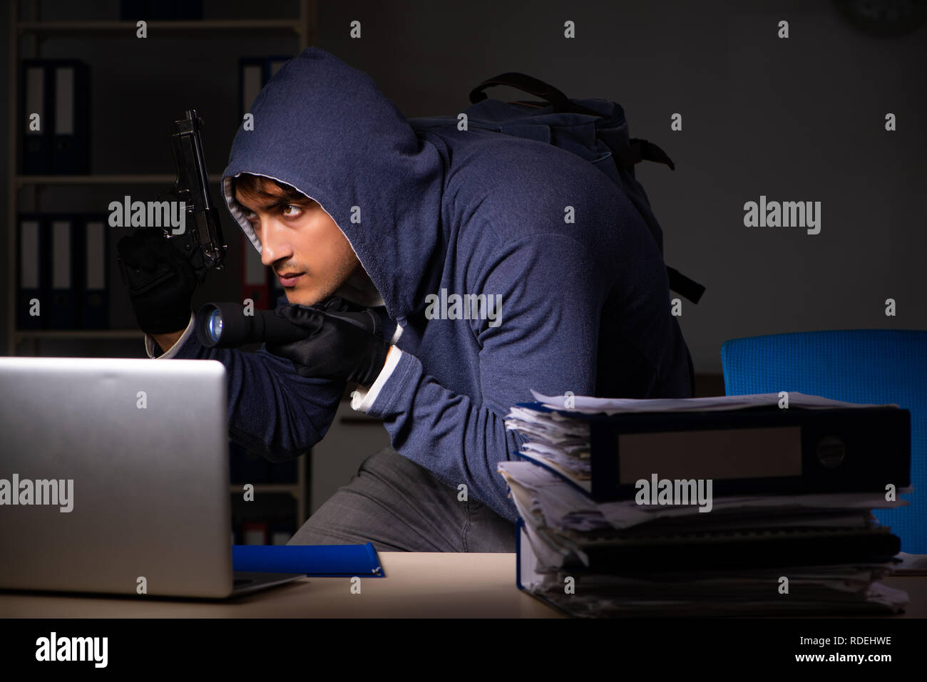 Thief trying to steal personal data in identity theft concept Stock ...