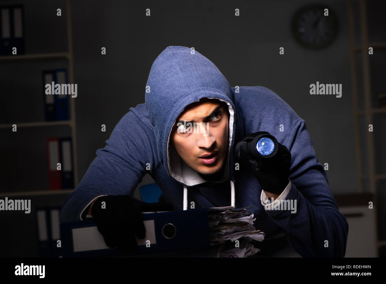 Thief trying to steal personal data in identity theft concept Stock ...