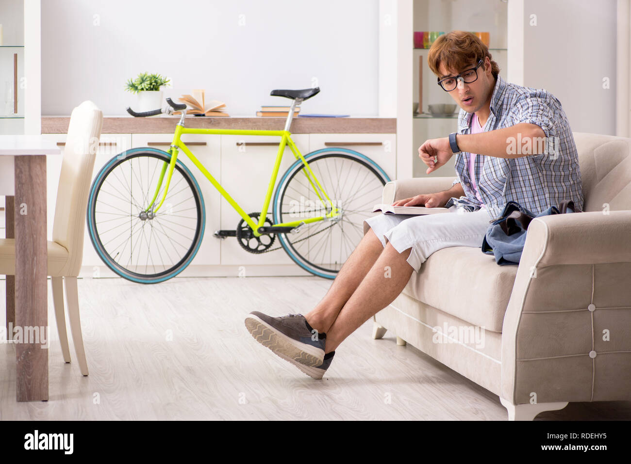 Student commuting to university using cycle Stock Photo - Alamy