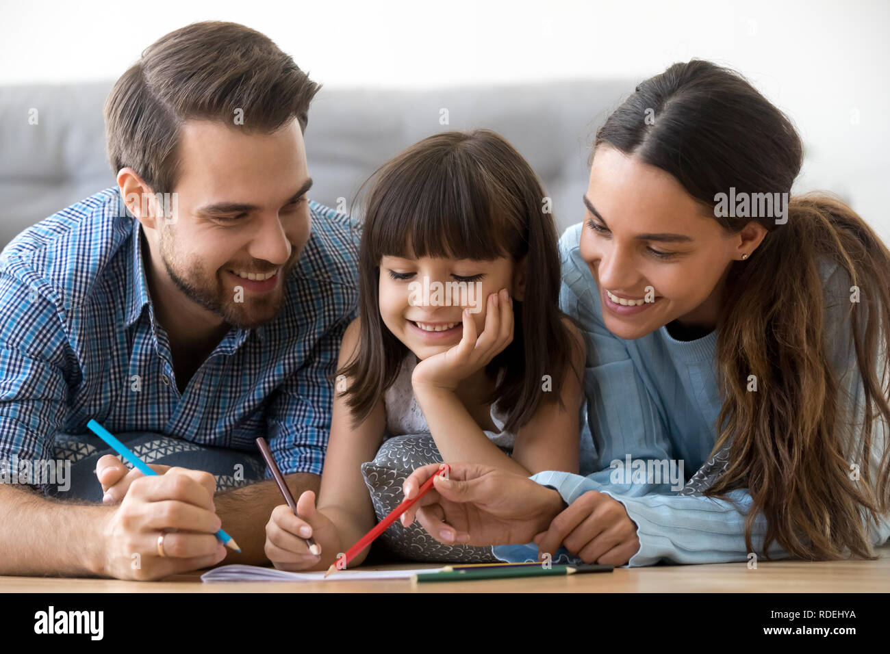 Caring mother teaching cute daughter hi-res stock photography and ...