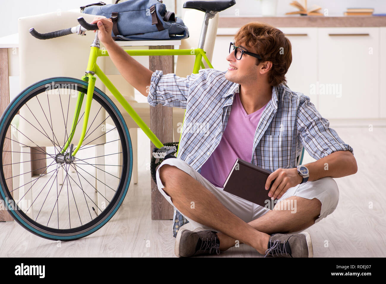 Student commuting to university using cycle Stock Photo - Alamy