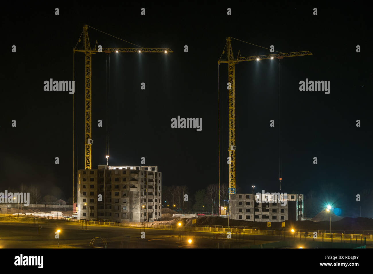 Tower cranes and unfinished multi-storey high buildings under ...