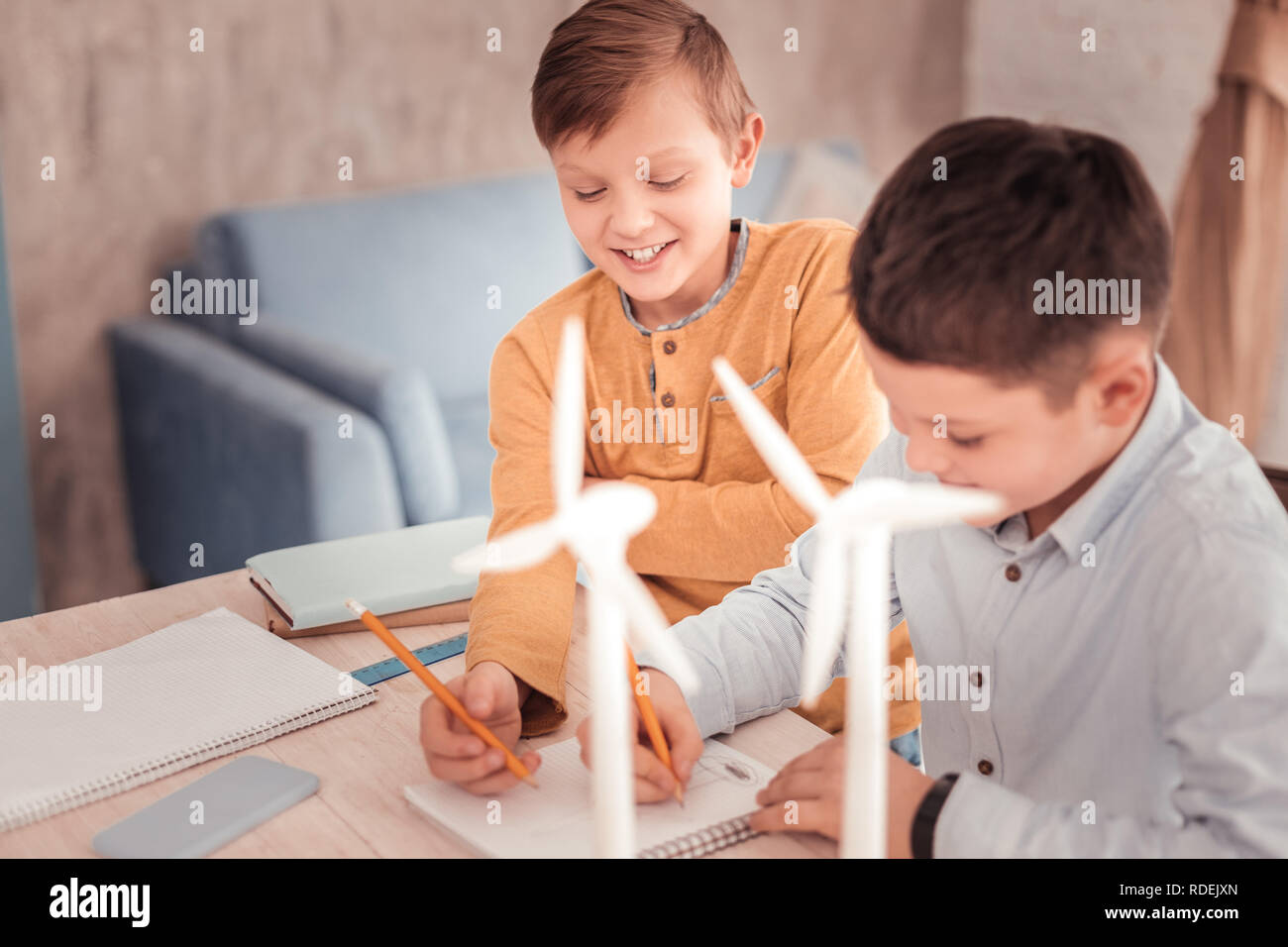 Two smart schoolboys spending their free time together Stock Photo - Alamy
