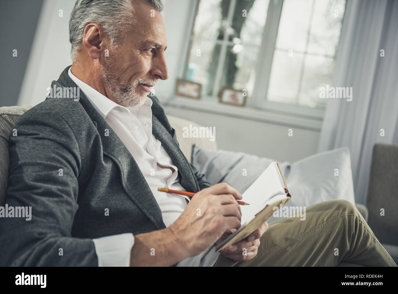 Creative journalist writing his new fresh ideas Stock Photo - Alamy