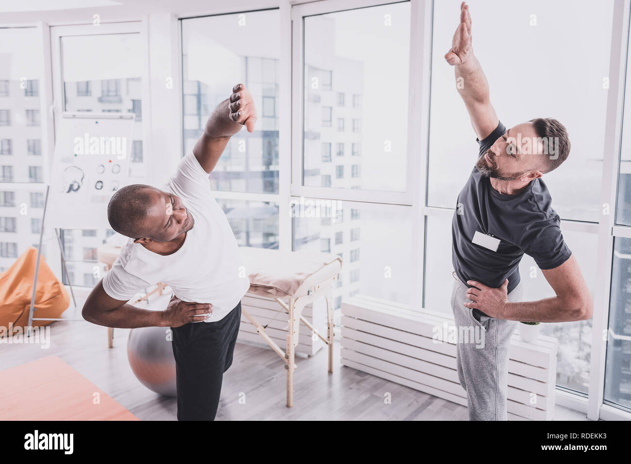Stretching back muscles hi-res stock photography and images - Alamy