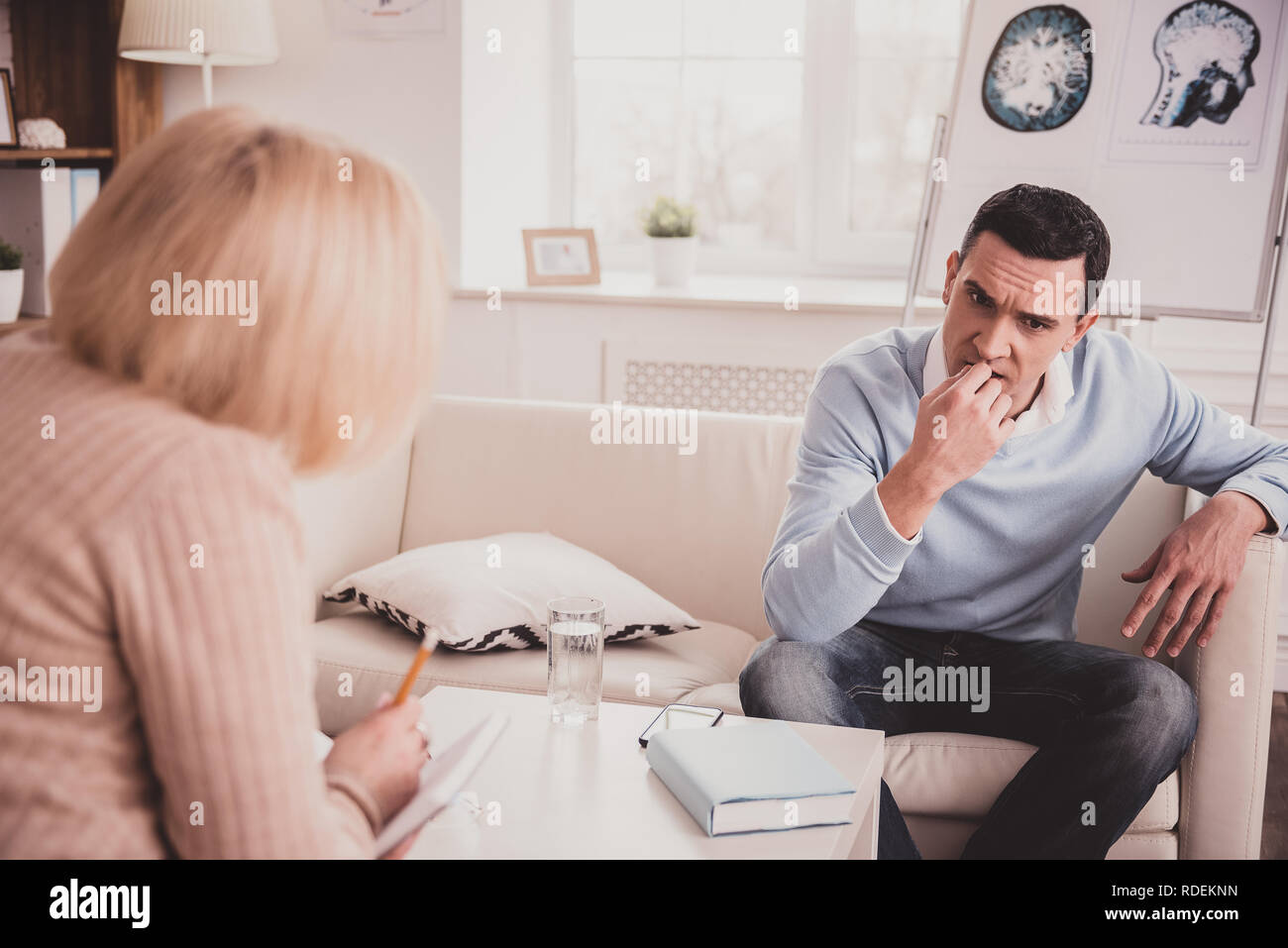 Serious male person thinking about problem decision Stock Photo - Alamy