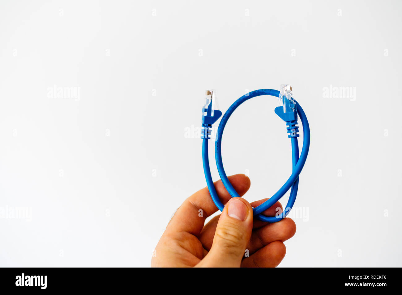 Ethernet cable hand hi-res stock photography and images - Alamy