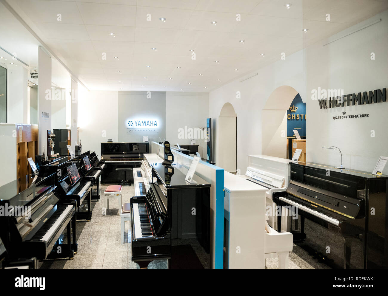 TRIER, GERMANY - FEB 21, 2015: Luxury piano shop musical instrument ...