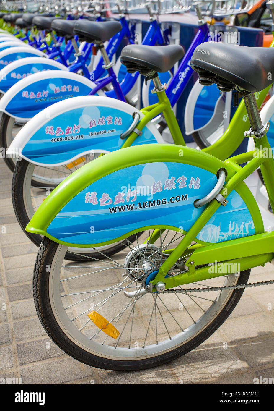Blue rental bicycles parked sharing hi-res stock photography and images ...