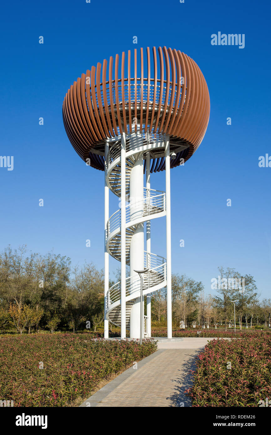 Modern architecture watchtower in a park. Chinese municipal governments ...