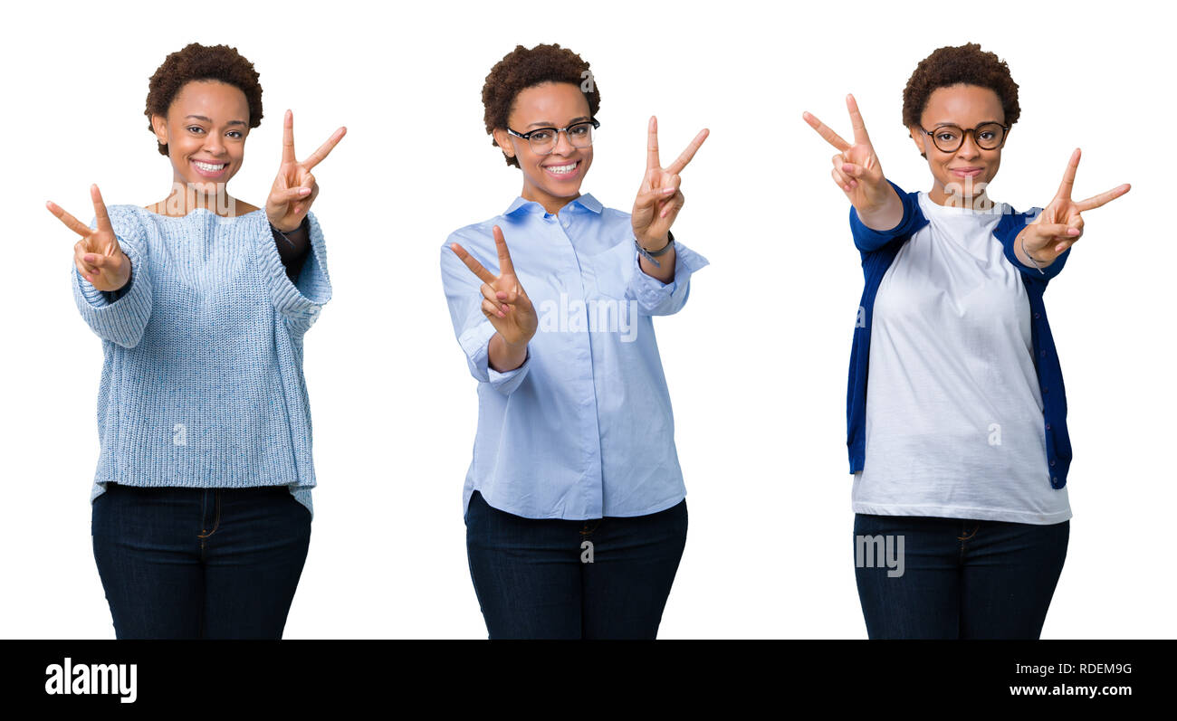 Young african american woman with afro hair over isolated background ...