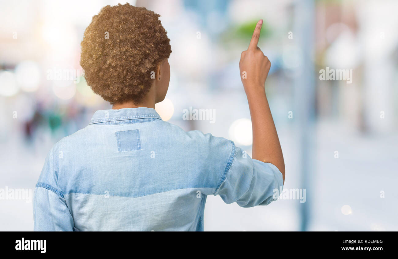 Young beautiful african american woman over isolated background Posing ...