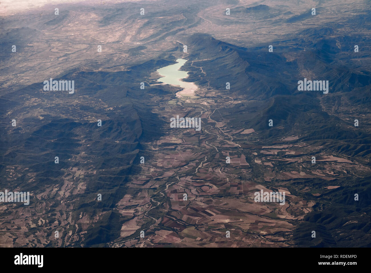View of sunset from inside the airplane through the window of Yesa ...