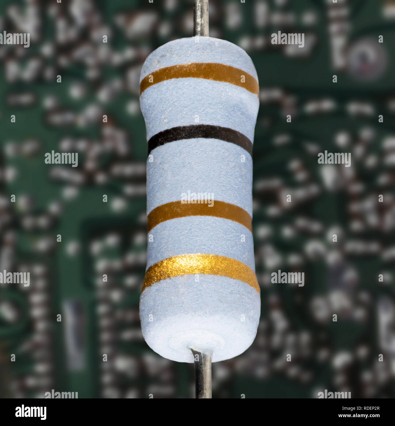 New resistor in front of a Circuit board that shows signs of age and ...