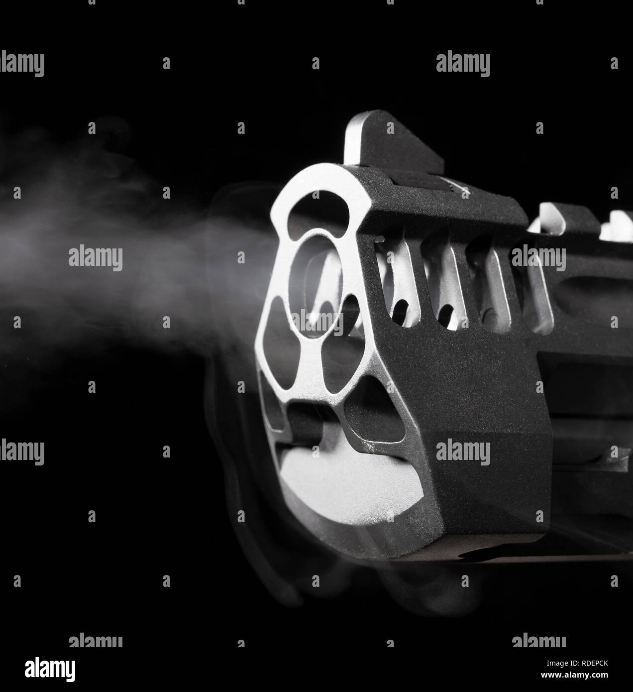 Barrel of a gun with smoke blowing out the front Stock Photo - Alamy