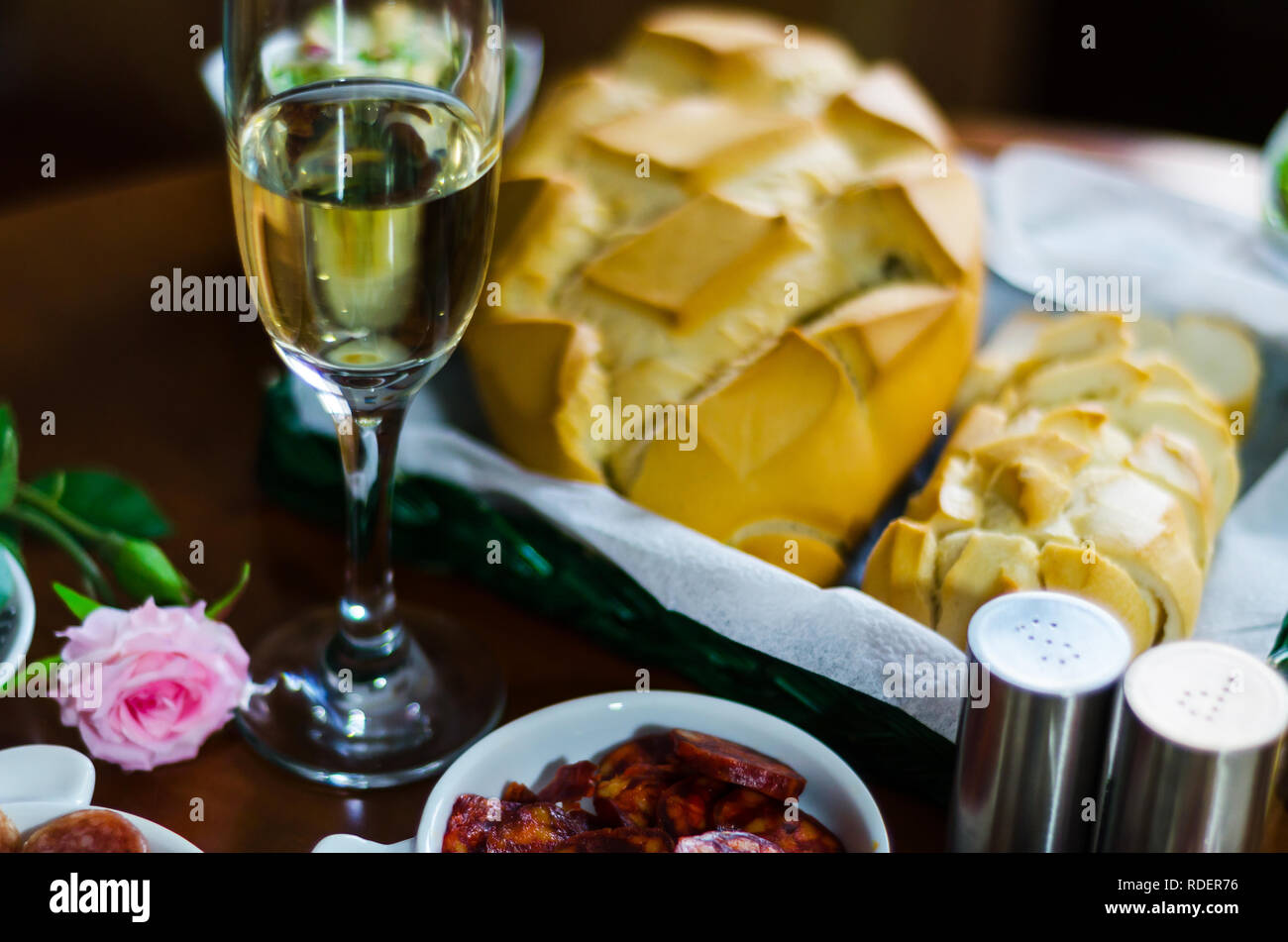 champagne with set appetizers in small portions, healthy and delicious ...