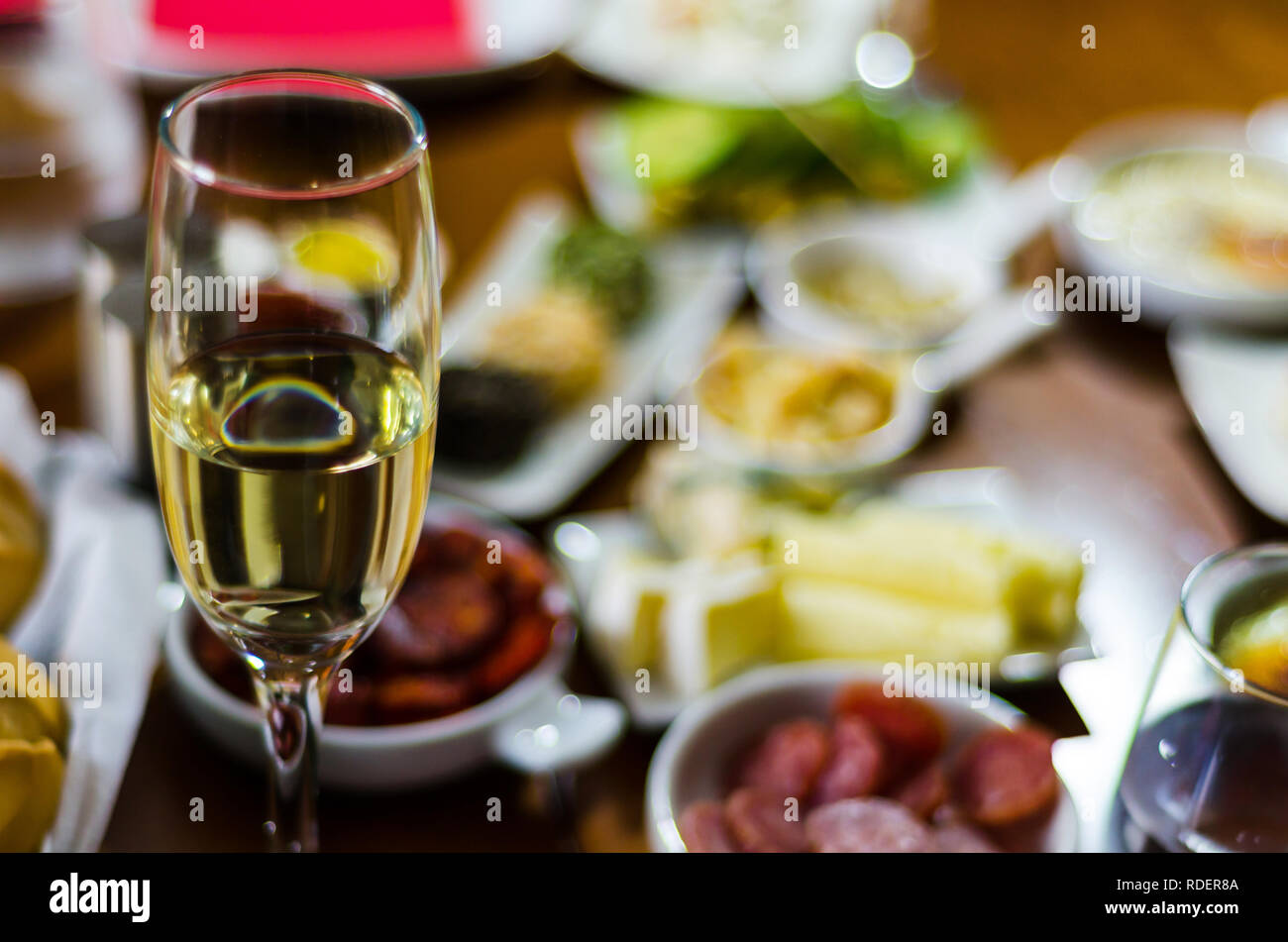 champagne with set appetizers in small portions, healthy and delicious ...