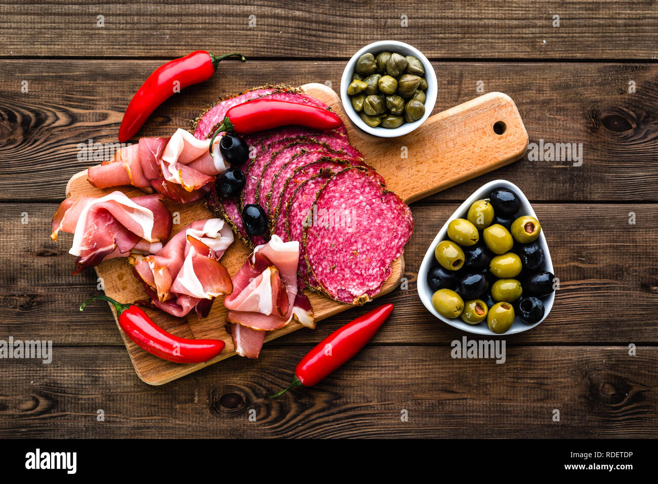 Cold meat platter with salami, slices ham prosciutto, italian antipasti ...