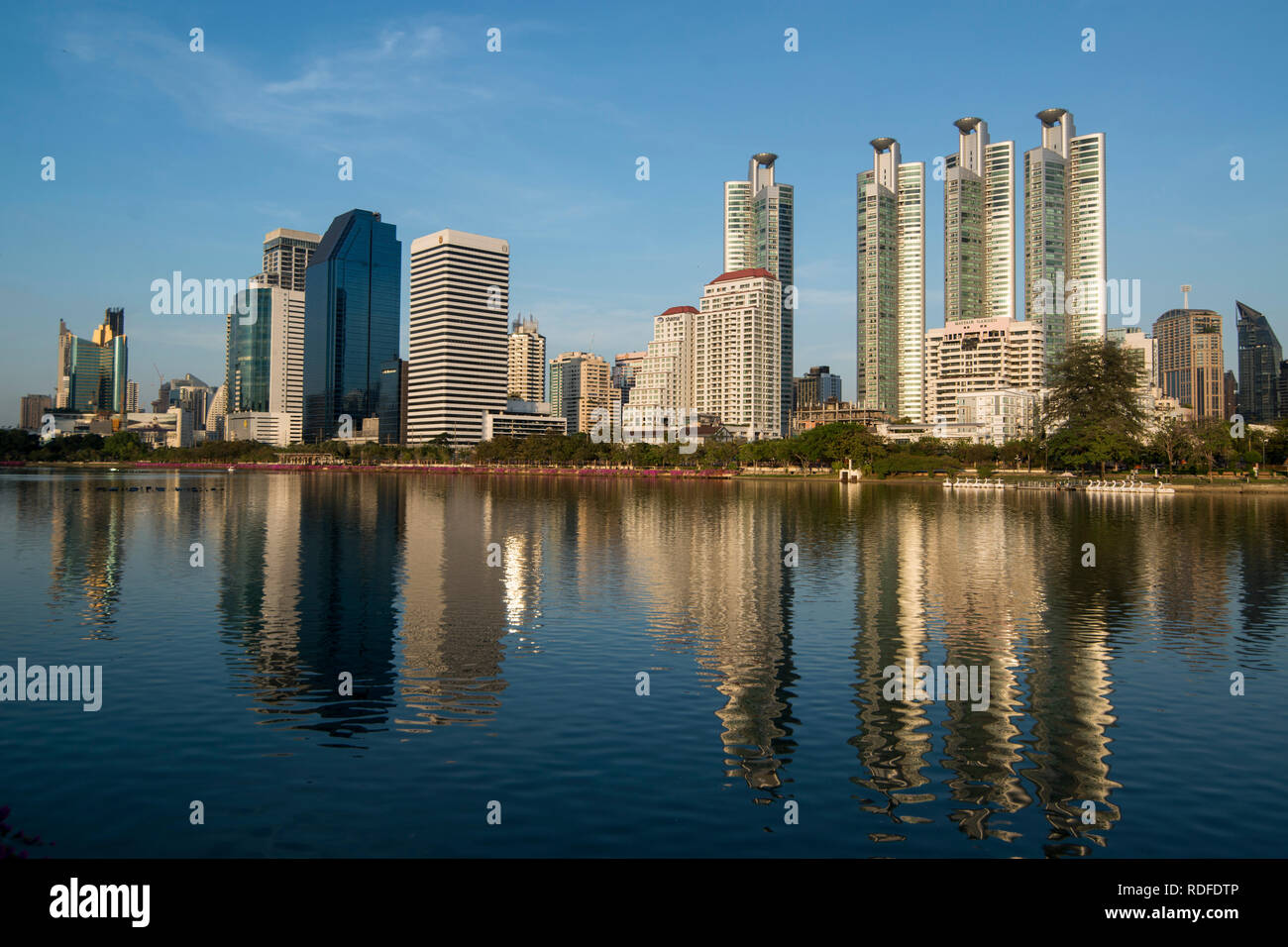 the skyline at the Ratchada Lake at the Ratchada Park in the city of ...