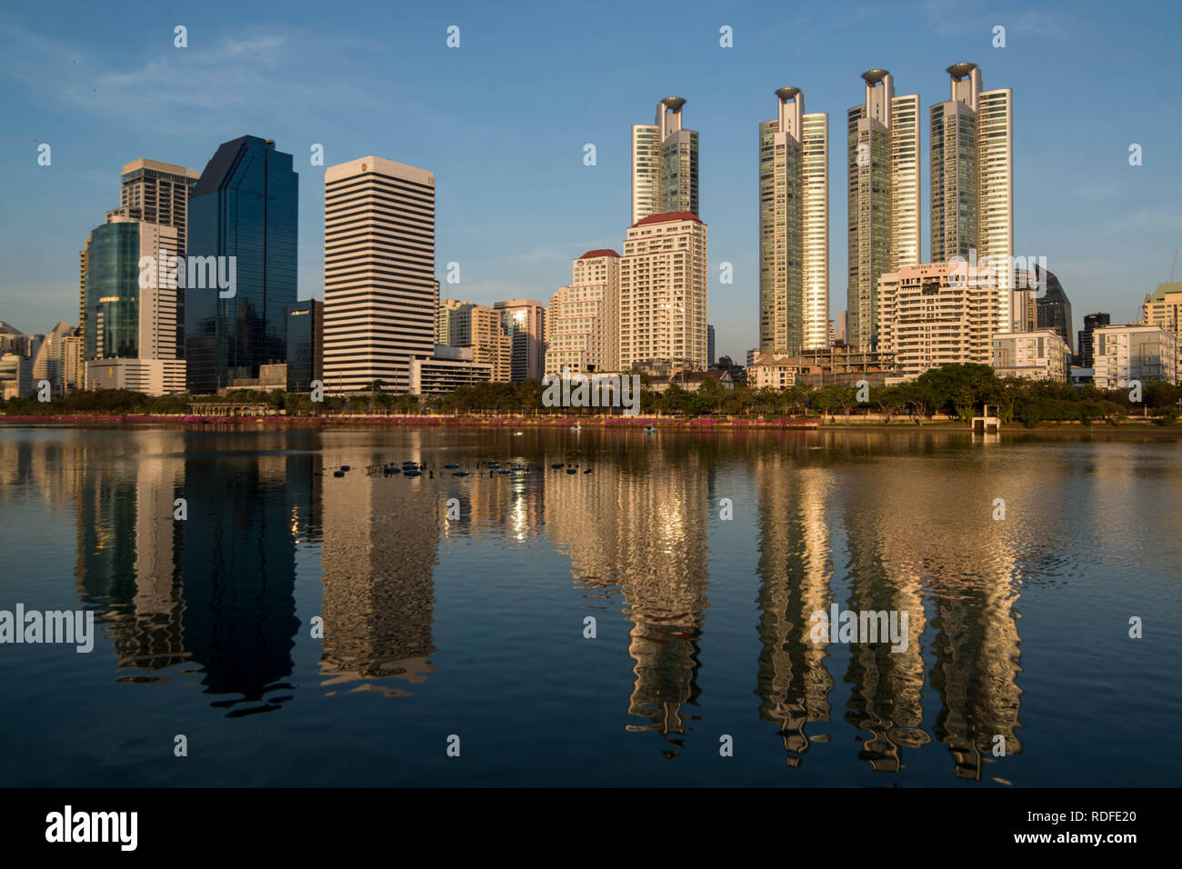 the skyline at the Ratchada Lake at the Ratchada Park in the city of ...