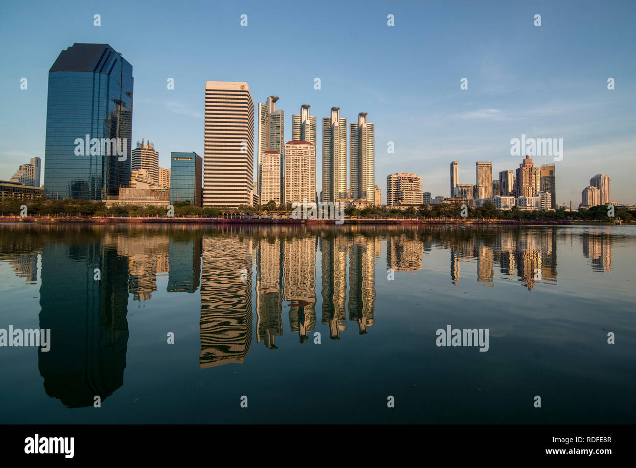 the skyline at the Ratchada Lake at the Ratchada Park in the city of ...