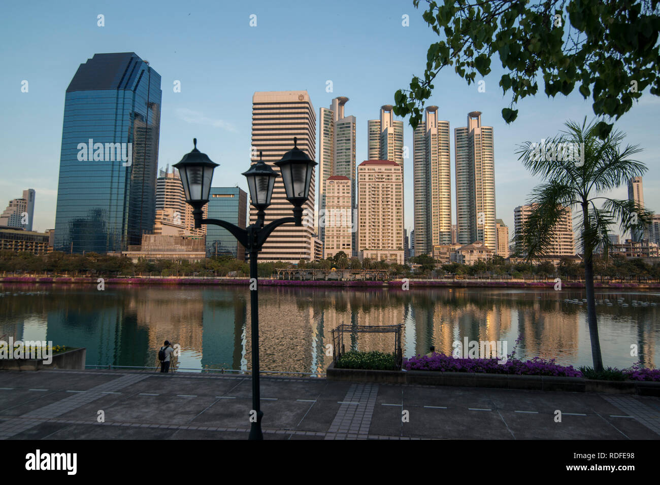 the skyline at the Ratchada Lake at the Ratchada Park in the city of ...