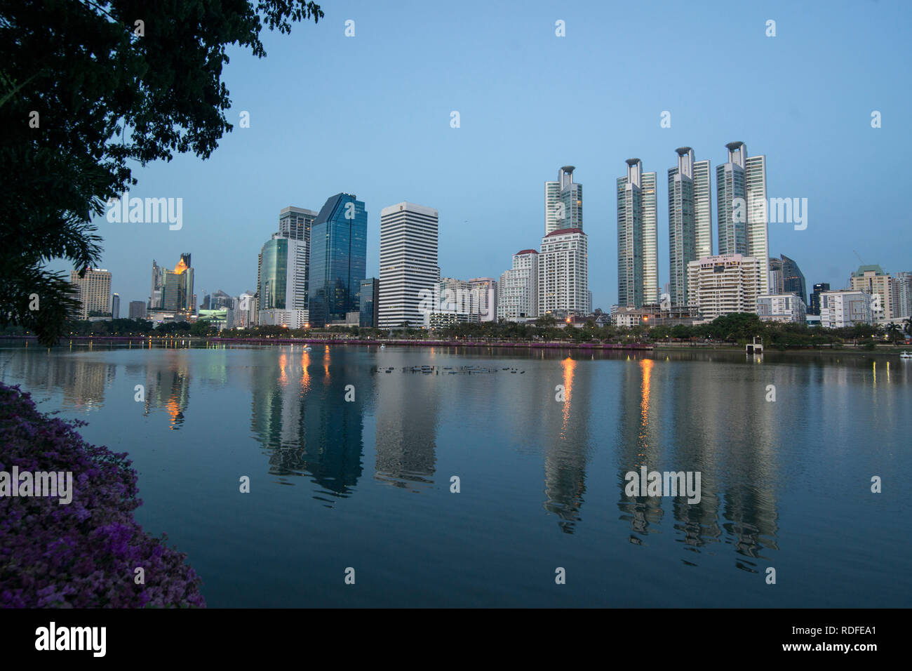 the skyline at the Ratchada Lake at the Ratchada Park in the city of ...