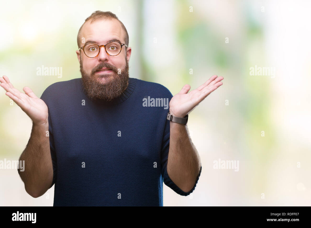 Young caucasian hipster man wearing sunglasses over isolated background ...