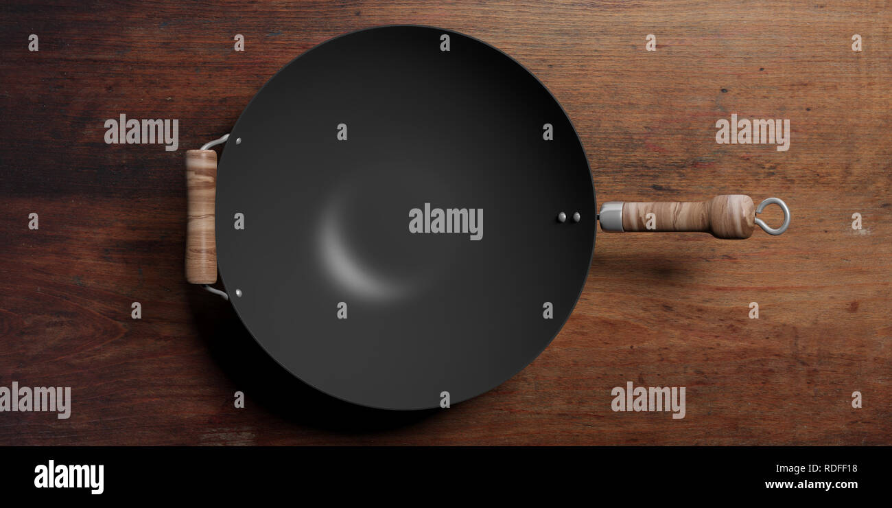Chinese Asian cuisine. Empty wok with wooden handles isolated on wood ...